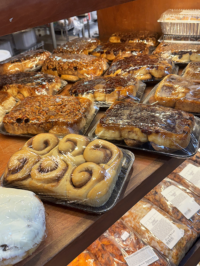 Sticky buns that would make your grandmother both jealous and proud. Caramel rivers flowing through cinnamon valleys&mdash;morning indulgence perfected.