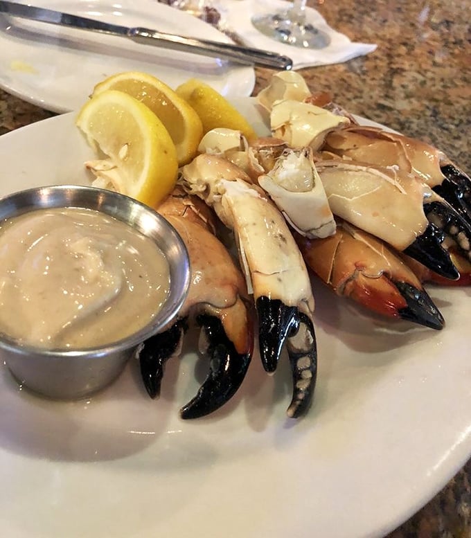 Stone crab claws with mustard sauce: Florida's answer to the question, "What does paradise taste like?" The answer is deliciously simple.