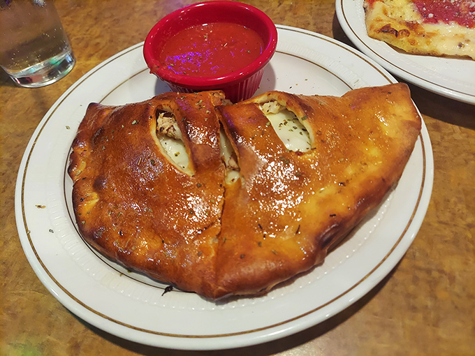 The golden-brown exterior of JoJo's stromboli is your passport to flavor country. One bite and you'll wonder why you've wasted time on lesser hand-held Italian delights.