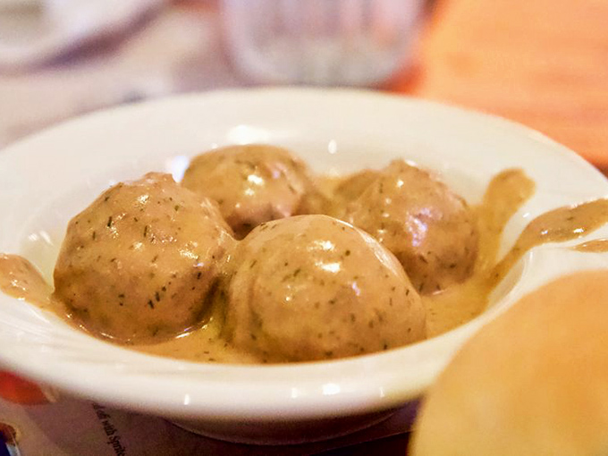 Swedish meatballs bathing in gravy like they're at a Nordic spa. These little spheres of joy demand to be savored slowly. 