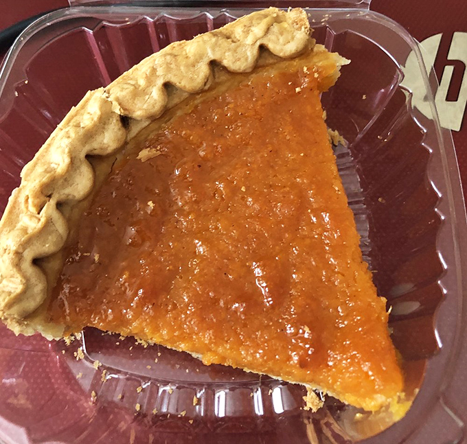 Sweet potato pie so good it makes you wonder why anyone bothers with birthday cake. The flaky crust is just showing off at this point.