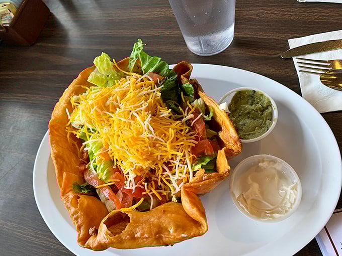 This taco salad doesn't just break out of its shell&mdash;it shatters expectations with fresh ingredients and two perfect sidekicks of sour cream and guacamole.