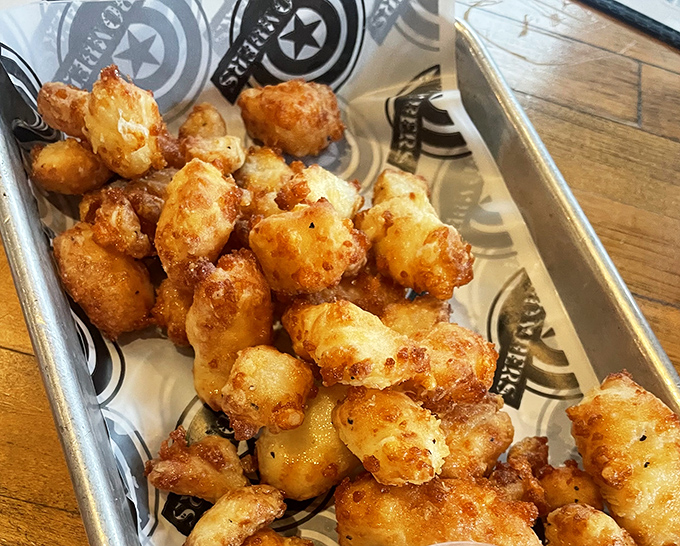 Wisconsin cheese curds: little golden nuggets of dairy perfection that somehow make you feel both guilty and proud with every blissful bite.