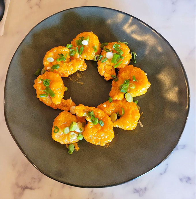 Golden tempura shrimp arranged like edible exclamation points &ndash; crispy, light, and gone before you know it.