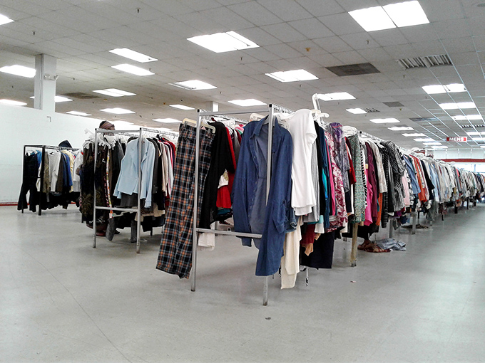 Clothing racks stretching endlessly, creating fashion highways where style meets unbeatable value in perfect harmony.