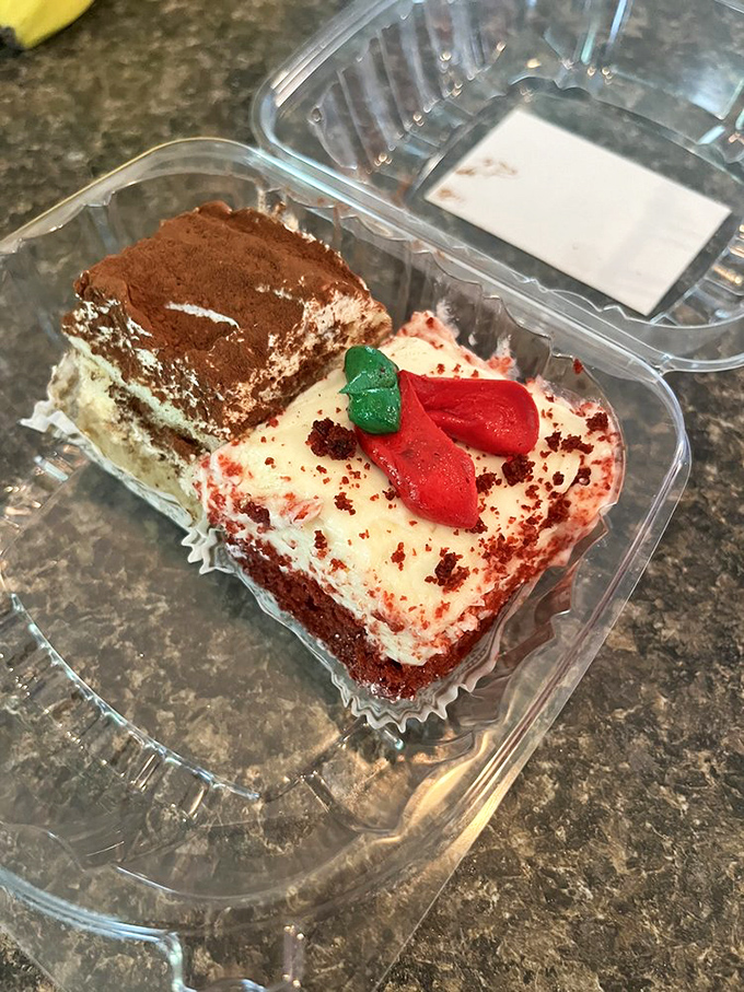 Red velvet and tiramisu squares playing nicely together in their clear container &ndash; like the dessert version of an apartment share that actually works out.