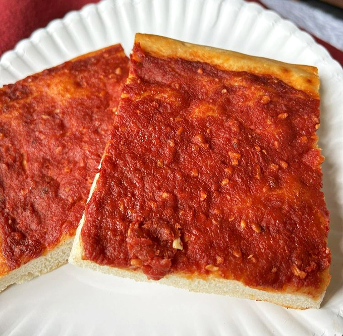 Serpe's legendary tomato pie isn't just food; it's an edible time machine transporting you straight to an Italian grandmother's kitchen.