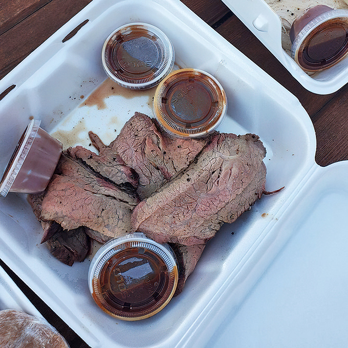 Tri-tip sliced to perfection, revealing that coveted smoke ring that whispers, "Someone here knows exactly what they're doing."