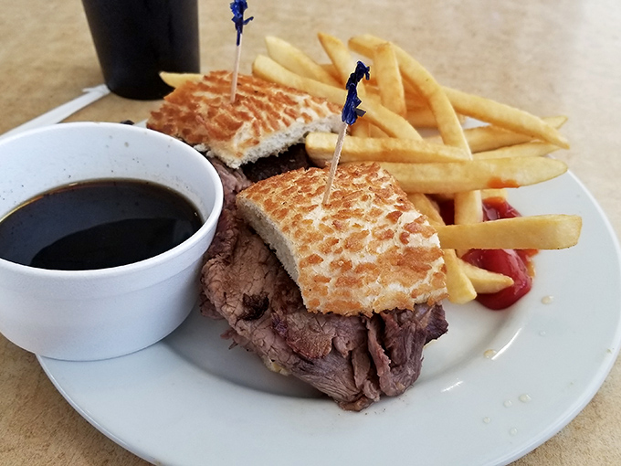 The French dip's sophisticated cousin &ndash; tender tri-tip on grilled sourdough with a side of jus that's practically liquid gold. Worth every napkin.