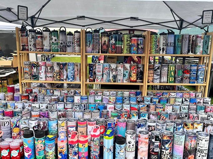 A rainbow explosion of tumblers and travel mugs that would make Marie Kondo simultaneously thrilled and terrified. Hydration has never been so personalized!