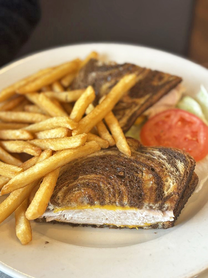 The humble tuna melt &ndash; elevated to art form. That perfect golden-brown exterior hides a creamy interior that puts fancy sandwiches to shame.
