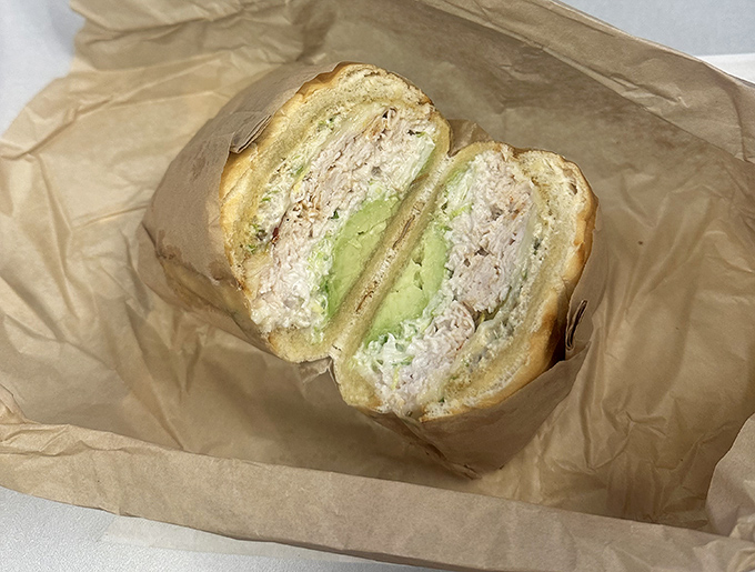 Layers of tuna and avocado create a creamy symphony that makes ordinary sandwiches hang their heads in shame.