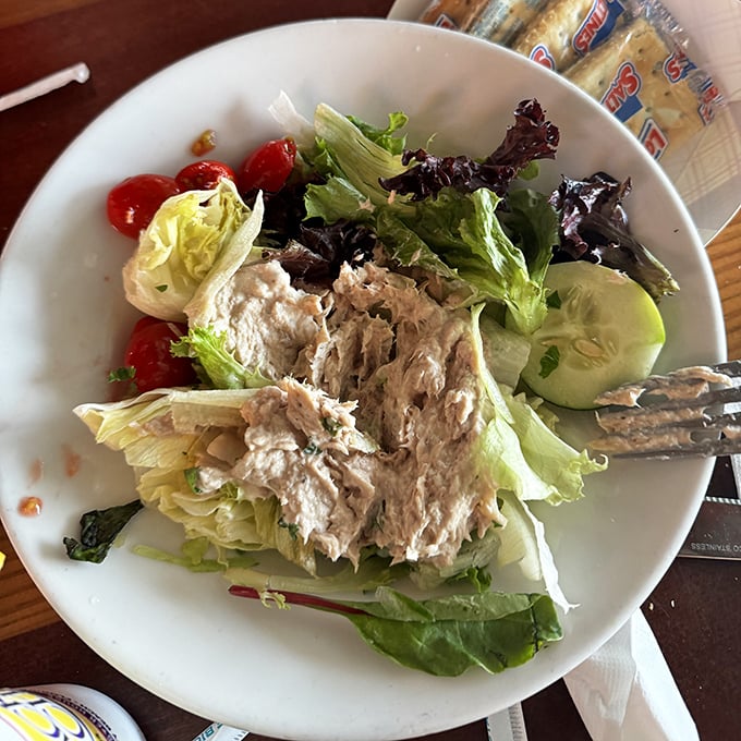 A tuna salad that actually respects the tuna&mdash;fresh, light, and served with enough greens to make you feel virtuous while on vacation.
