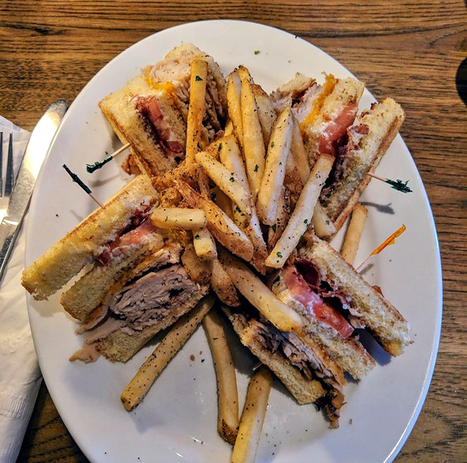 The club sandwich &ndash; architecture you can eat! Layers of turkey, bacon, and veggies stacked so perfectly you almost feel bad dismantling it. Almost.