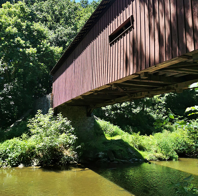 From below, the bridge's impressive engineering reveals itself&mdash;a perfect marriage of form and function spanning the tranquil waters.