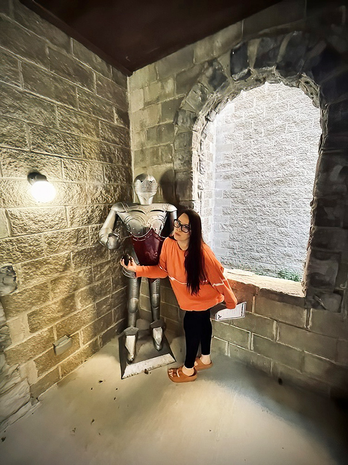 The castle's stone corridors house silent guardians of metal and memory. This suit of armor won't judge if you take a selfie&mdash;he's used to posing.