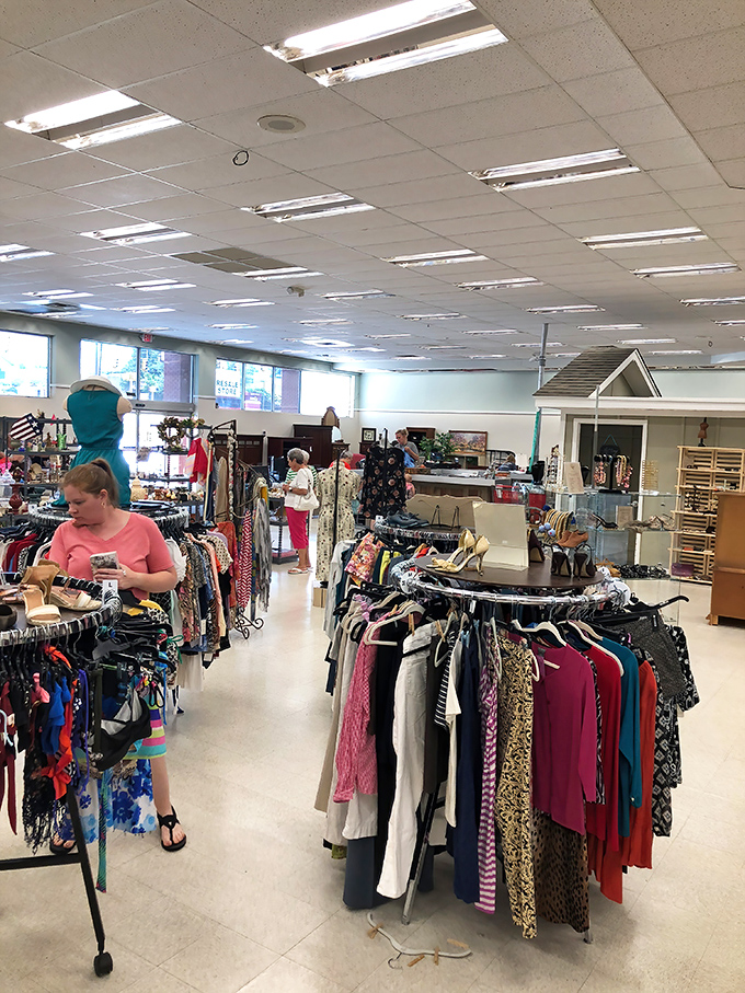 The natural habitat of the savvy shopper: navigating clothing racks with the focus of an archaeologist on the verge of a major discovery.