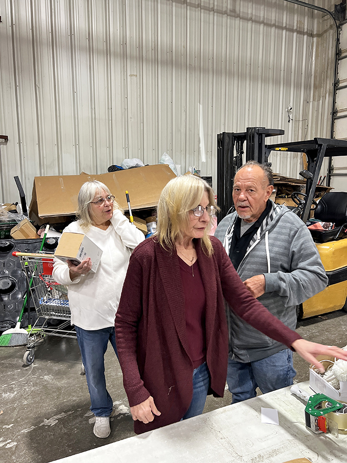 Serious bargain hunters in their natural habitat. These shoppers demonstrate the focus and determination that separates casual browsers from professional deal-finders.