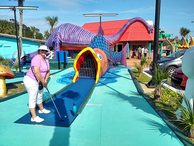 "Feed me, Seymour!" This hungry purple dinosaur swallows golf balls with gusto, challenging players to navigate its cavernous mouth.