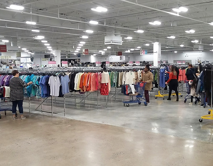 The spacious clothing department features color-coordinated racks that would make Marie Kondo weep with organizational joy.