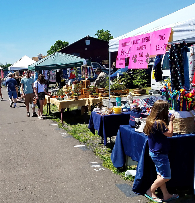 The real Rice's experience: browsing tables under blue skies, where shoppers hunt for bargains with the focus of archaeologists discovering ancient treasure.