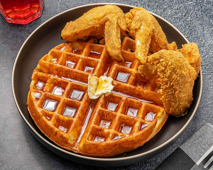The ultimate Southern power couple: crispy fried chicken and golden waffles. Romeo and Juliet with better taste and a happier ending.