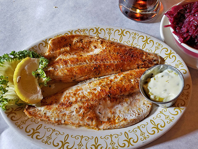 Walleye so perfectly cooked it should have its own Instagram account. That red cabbage side dish is the unsung hero your plate deserves.