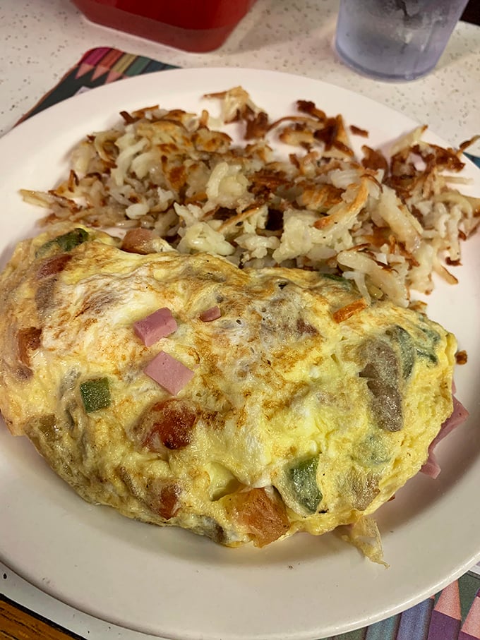 This Western omelet with crispy hashbrowns isn't just breakfast&mdash;it's edible therapy after a long week. Worth setting your alarm for.