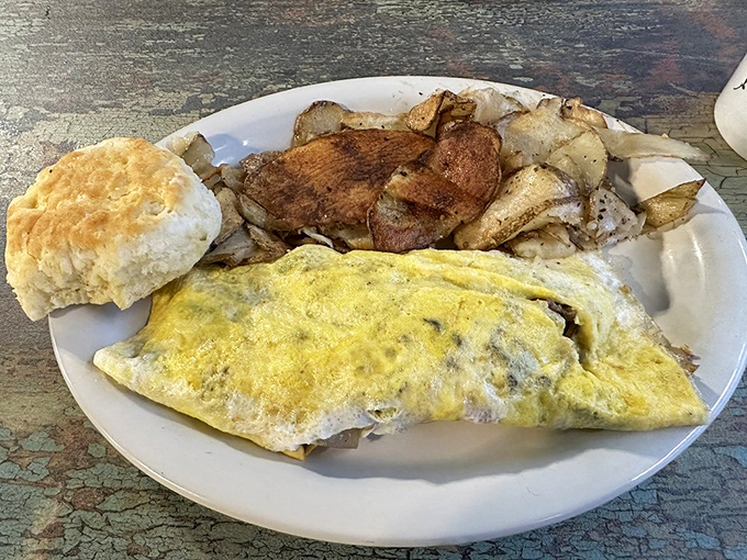 This western omelet arrives fluffy, generous, and ready to fuel your entire day with pure breakfast bliss.