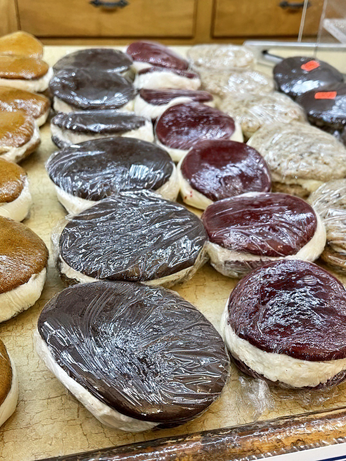 These whoopie pies aren't just desserts, they're edible hockey pucks of joy lined up like soldiers in a delicious sugary army.