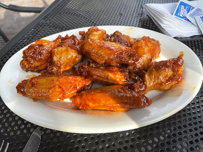 These aren't just wings; they're flavor vehicles glazed to sticky perfection. The kind that make you forget napkins exist until it's too late.
