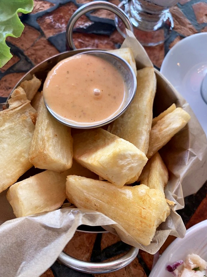 Yuca fries: Cuba's answer to French fries, but with more personality and a spicy dipping sauce that'll make potato wedges jealous.