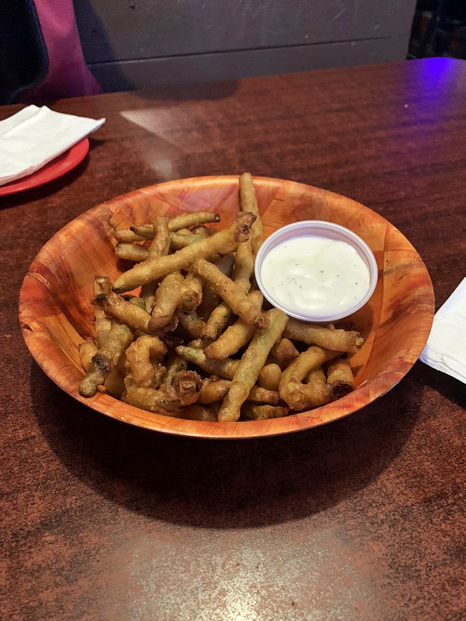 Zucchini fries: the vegetable that forgot it was supposed to be healthy. That dipping sauce isn't just condiment—it's accomplice.