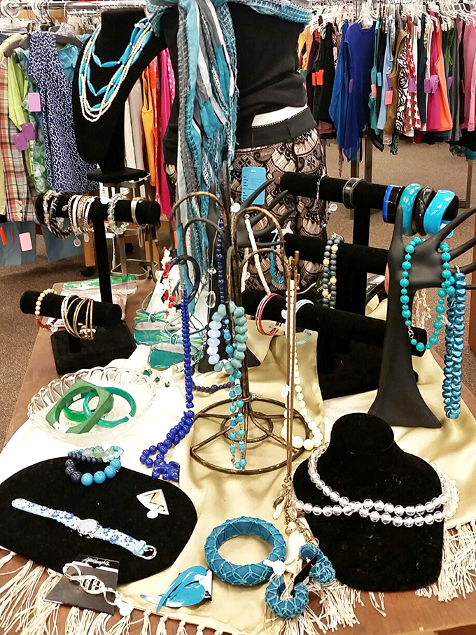 Jewelry that whispers tales of previous lives, now arranged like an azure treasure map. Those turquoise beads are practically begging for a second act.