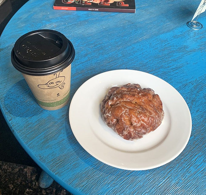 This apple fritter isn't just a pastry, it's a commitment&mdash;gloriously glazed, perfectly puffed, and waiting to be your breakfast wingman alongside that house coffee.