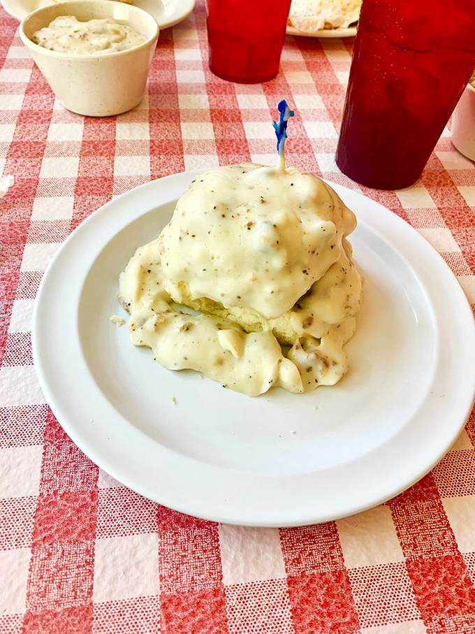Biscuits and gravy that would make your grandmother both proud and jealous. The pepper-flecked gravy blankets everything in creamy comfort.