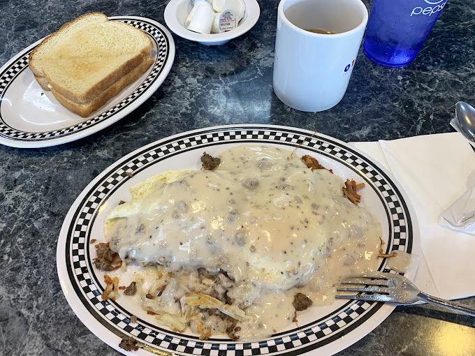 Biscuits and gravy so good they should be illegal&mdash;a creamy, peppery blanket covering potatoes that never stood a chance.