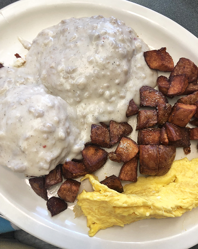 Biscuits and gravy so good they should require a permission slip. Those home fries look like they've achieved the perfect crisp-to-tender ratio.