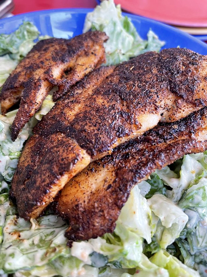 Blackened fish so perfectly seasoned, it makes you wonder if mermaids are secretly working in the kitchen.