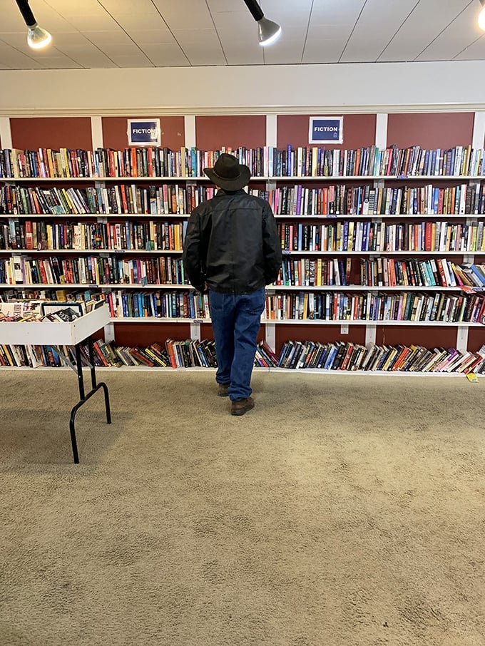 The fiction section: where bookworms and bargain hunters unite. That gentleman might just be discovering the next great American novel for $2.