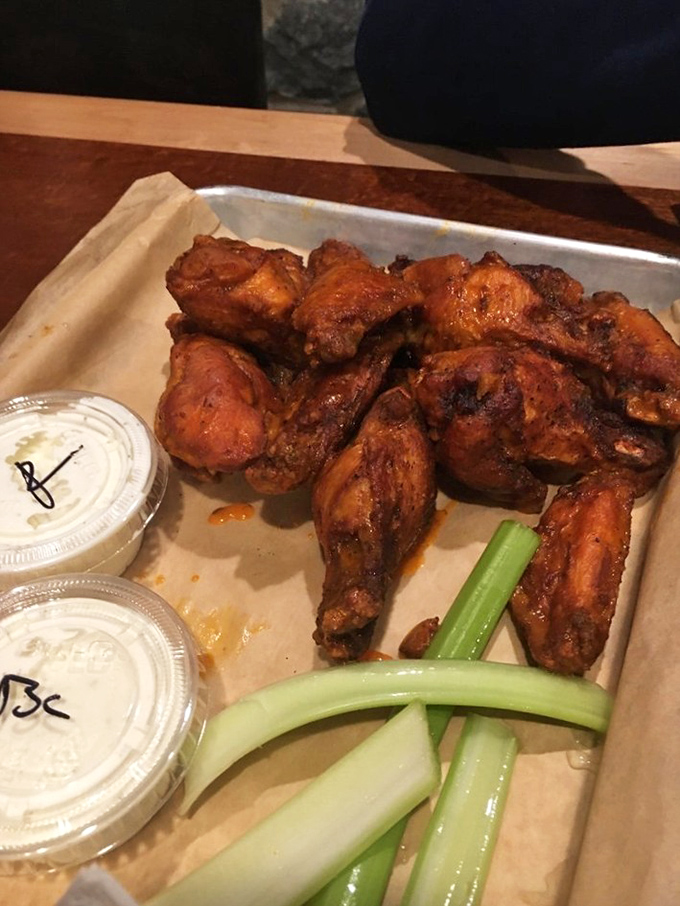 Buffalo wings that make you understand why people willingly smear orange sauce all over their faces in public without shame.