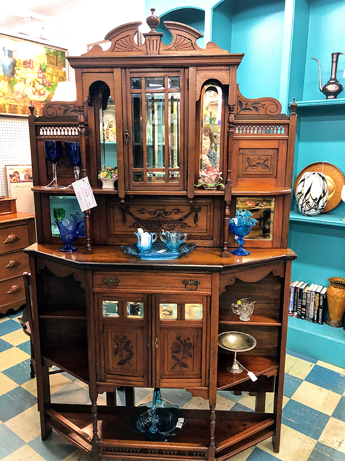 This Victorian-era cabinet wasn't just furniture&mdash;it was Facebook, family storage, and status symbol all rolled into one magnificent wooden showpiece.