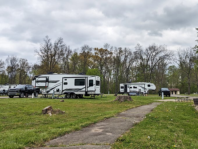 Modern nomads find their temporary homes among the trees, where WiFi signals struggle but conversation flourishes.