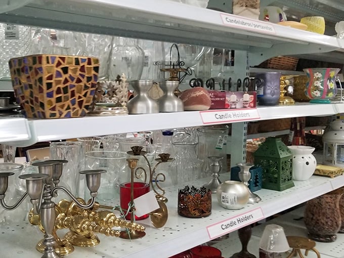 Candle holders galore! From elegant silver candelabras to that leopard-print monstrosity someone's mother-in-law definitely gifted at Christmas.