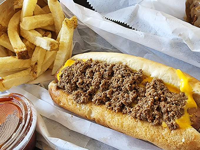 Cheesesteaks get the Pennsylvania treatment here, where the meat-to-cheese ratio achieves mathematical perfection that would make Einstein proud.