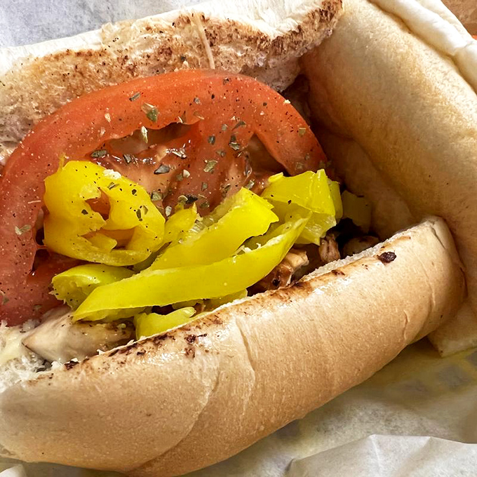 These chicken cheesesteaks aren't just sandwiches; they're architectural marvels of meat, cheese, and veggies that would make Frank Lloyd Wright hungry.