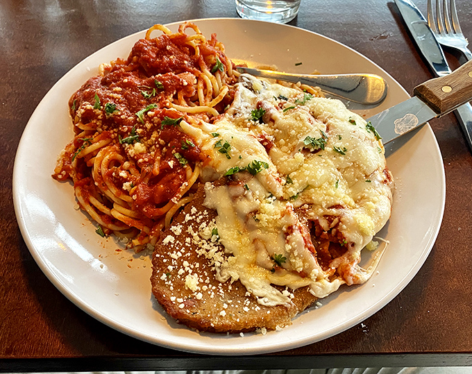 Chicken Parmesan and pasta that doesn't just satisfy hunger&mdash;it creates a momentary crisis where you can't decide whether to savor slowly or devour immediately.