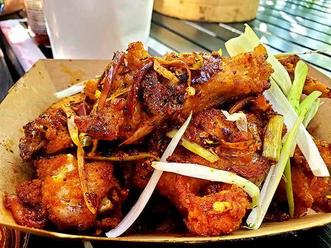 The infamous wings that sparked a San Diego sensation. Crispy, caramelized, and garnished with fresh scallions&mdash;these are worth the drive from anywhere in California.