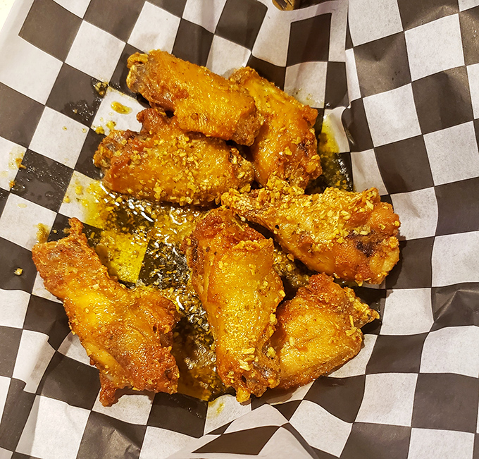 These wings aren't just golden-fried, they're trophies of flavor that demand to be photographed before they disappear.