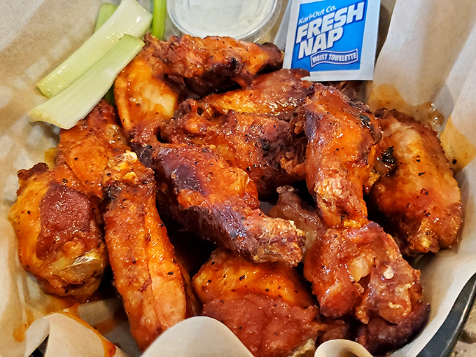 Chicken wings so perfectly lacquered they could make Colonel Sanders weep with envy. That crispy skin is hiding some seriously juicy meat.